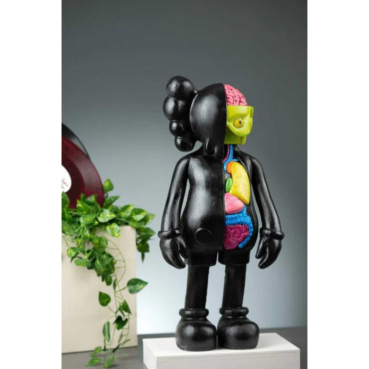 Inner Beauty: The Black KAWS Figure by Artchi