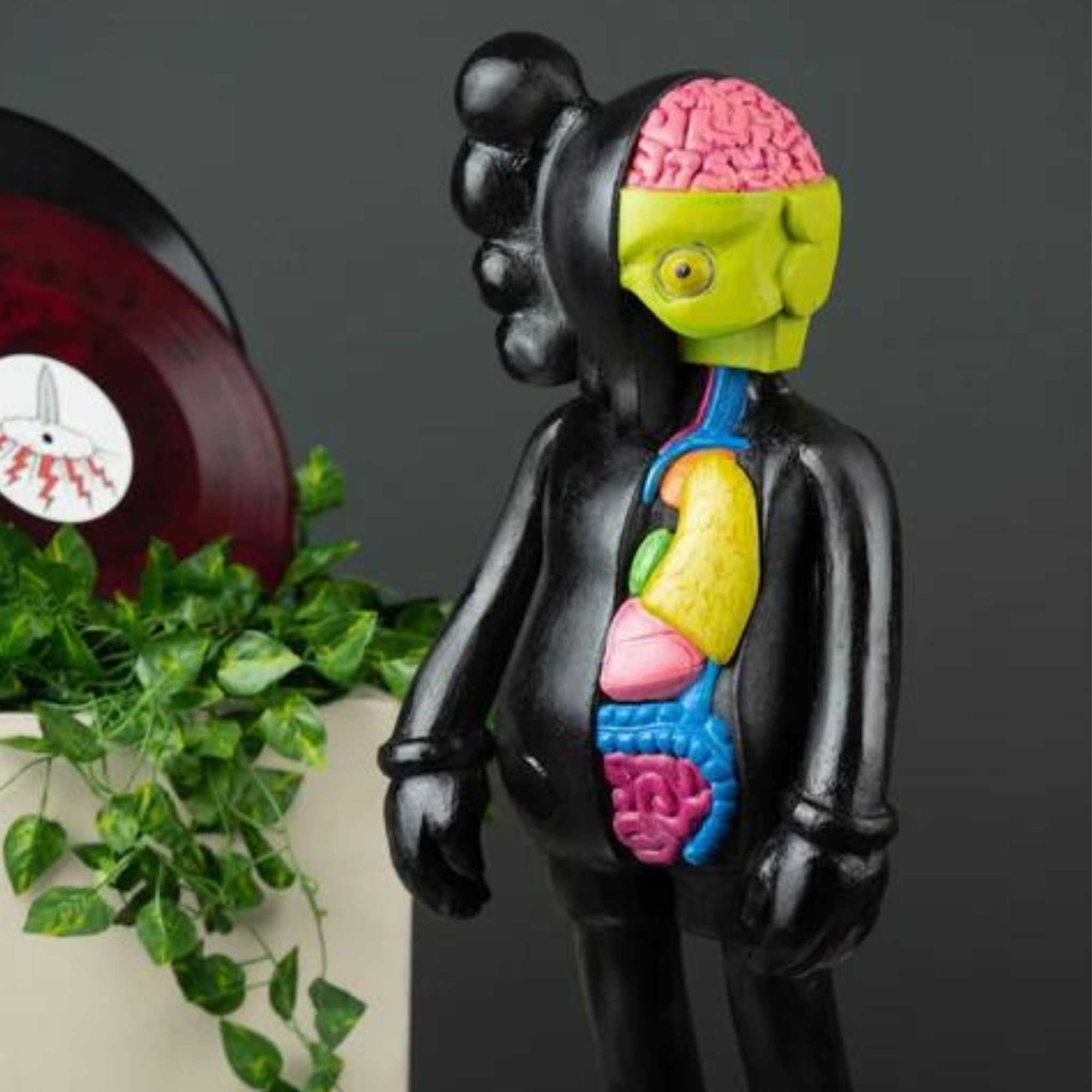 Inner Beauty: The Black KAWS Figure by Artchi
