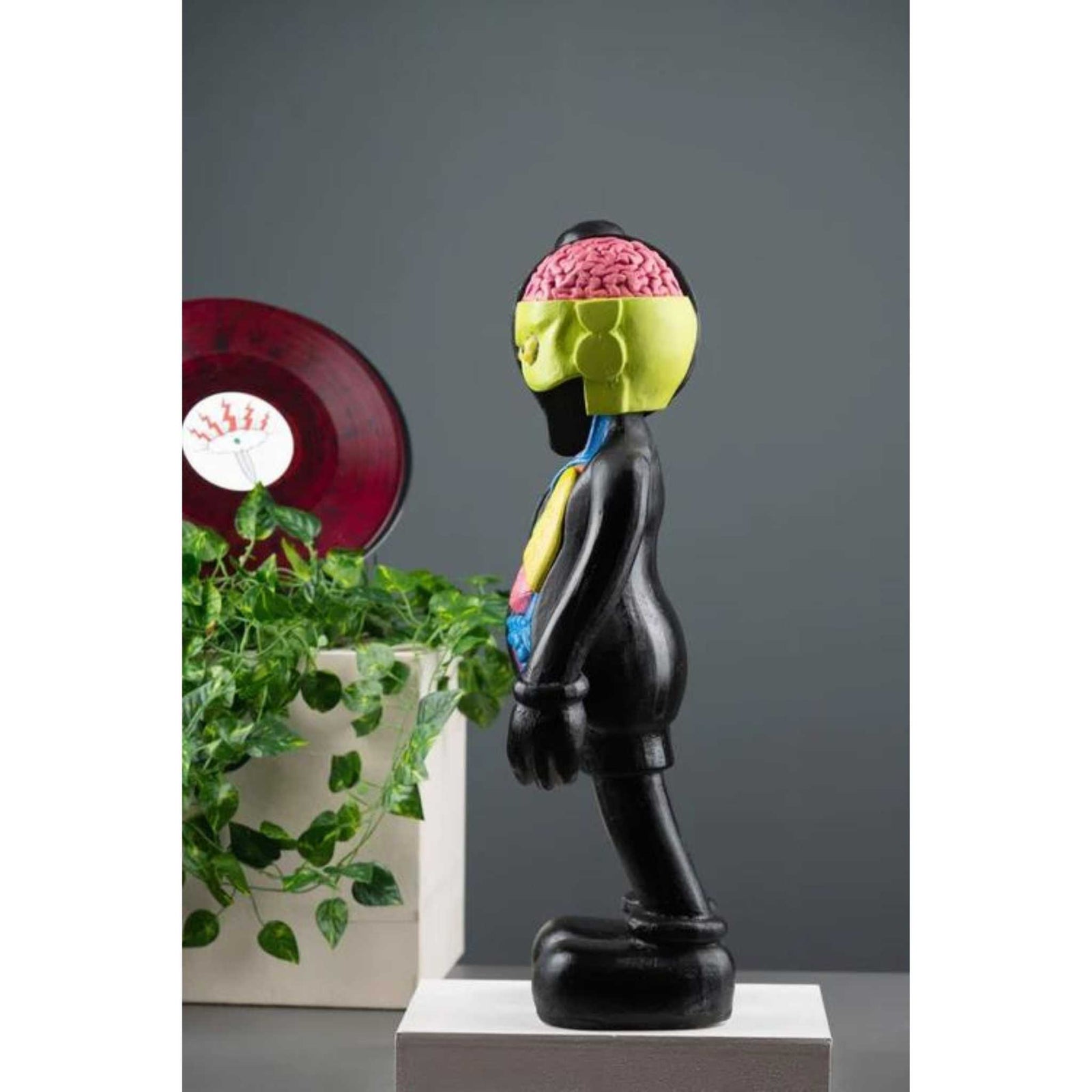 Inner Beauty: The Black KAWS Figure by Artchi